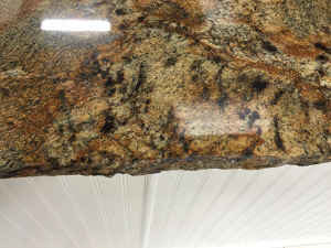 Raw Edge Granite Countertops Add Rugged Aspect in the Kitchen